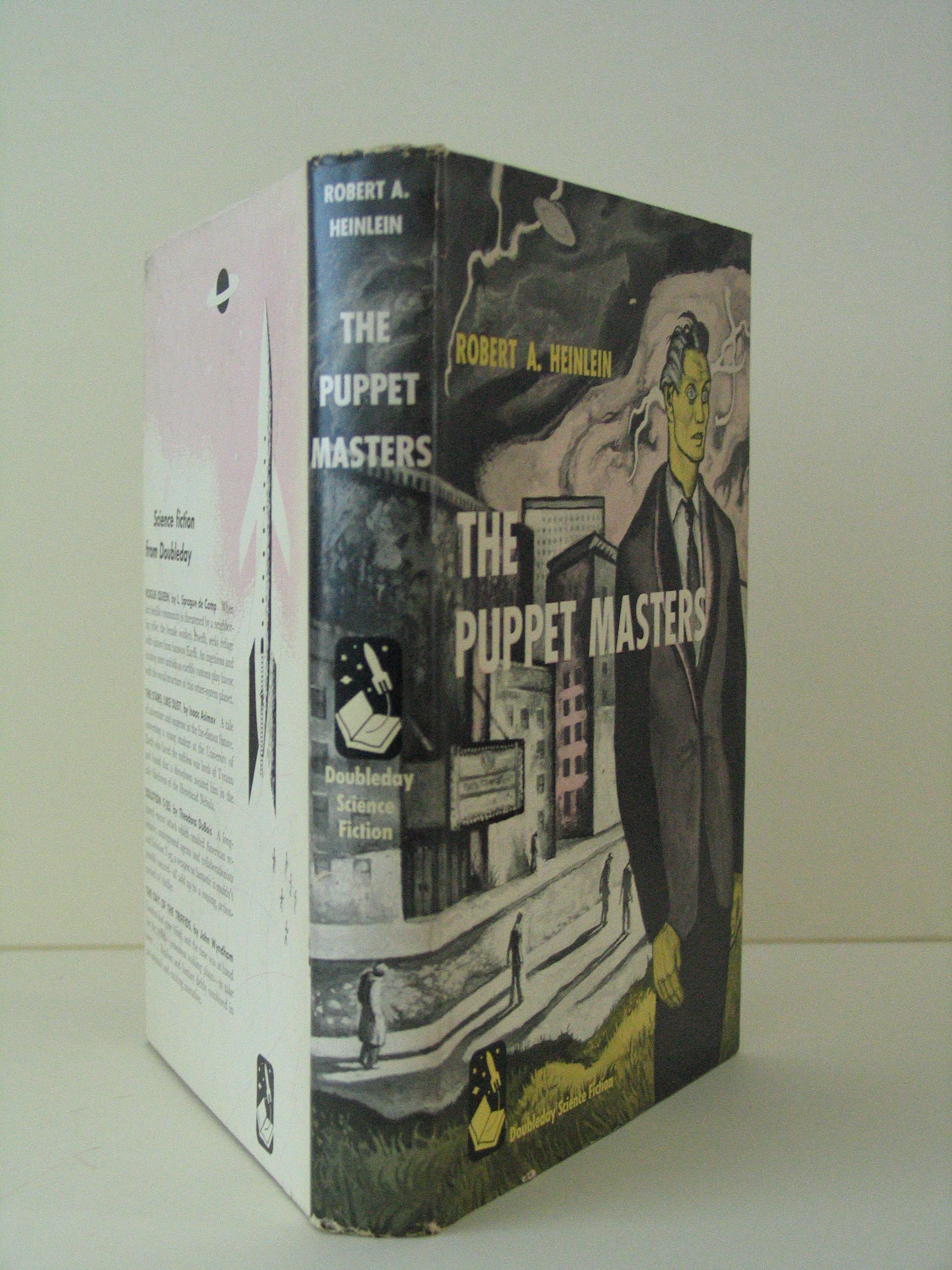 The Puppet Masters. - Books - PBFA